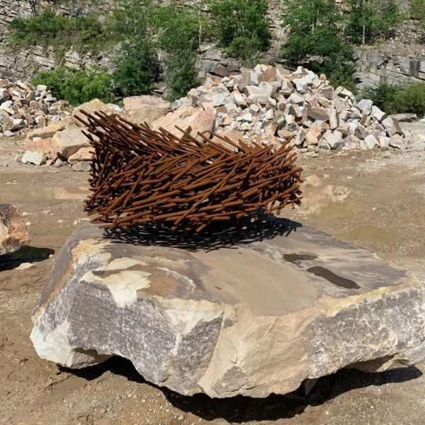 CORTEN STEEL ROD NEST ON A ROCK – firefeatures